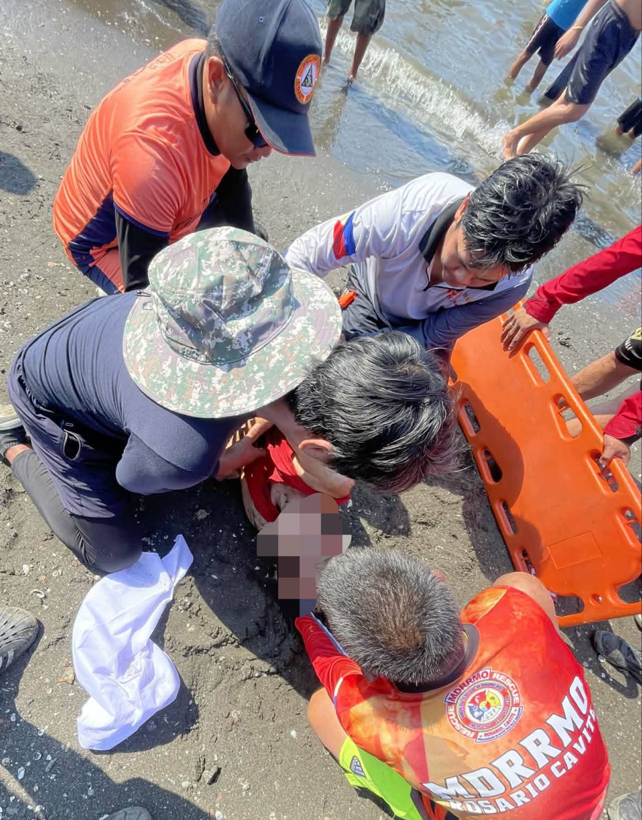 MDRRMO rescuers revive drowning elderly man at Cavite beach resort ...